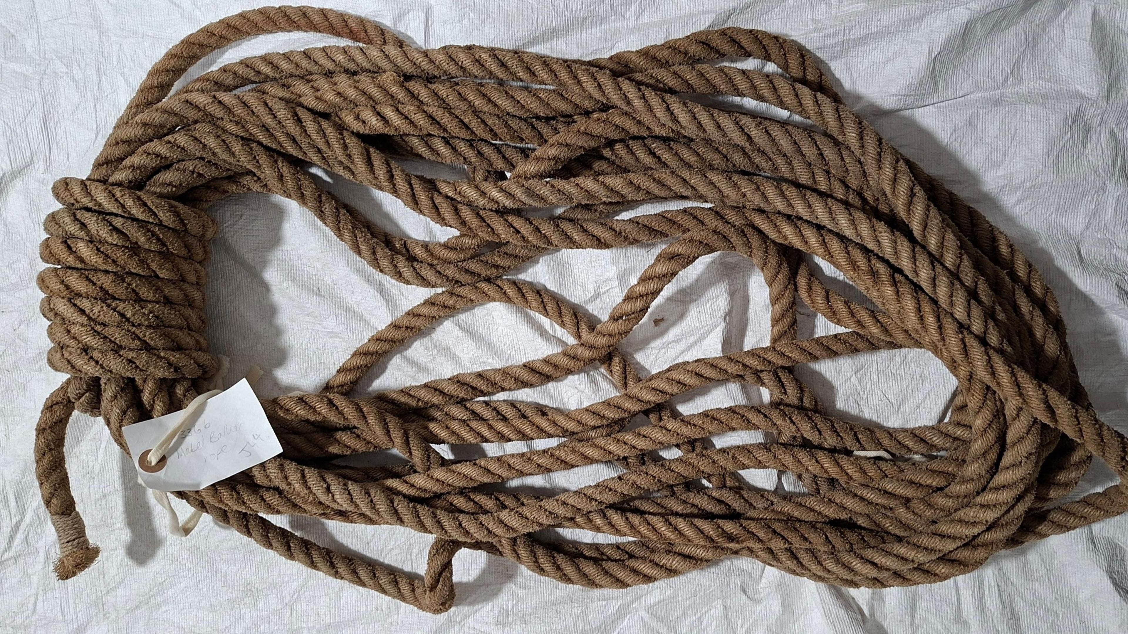 Boots and rope from Mabel Barker's Scafell climb among treasures - BBC News