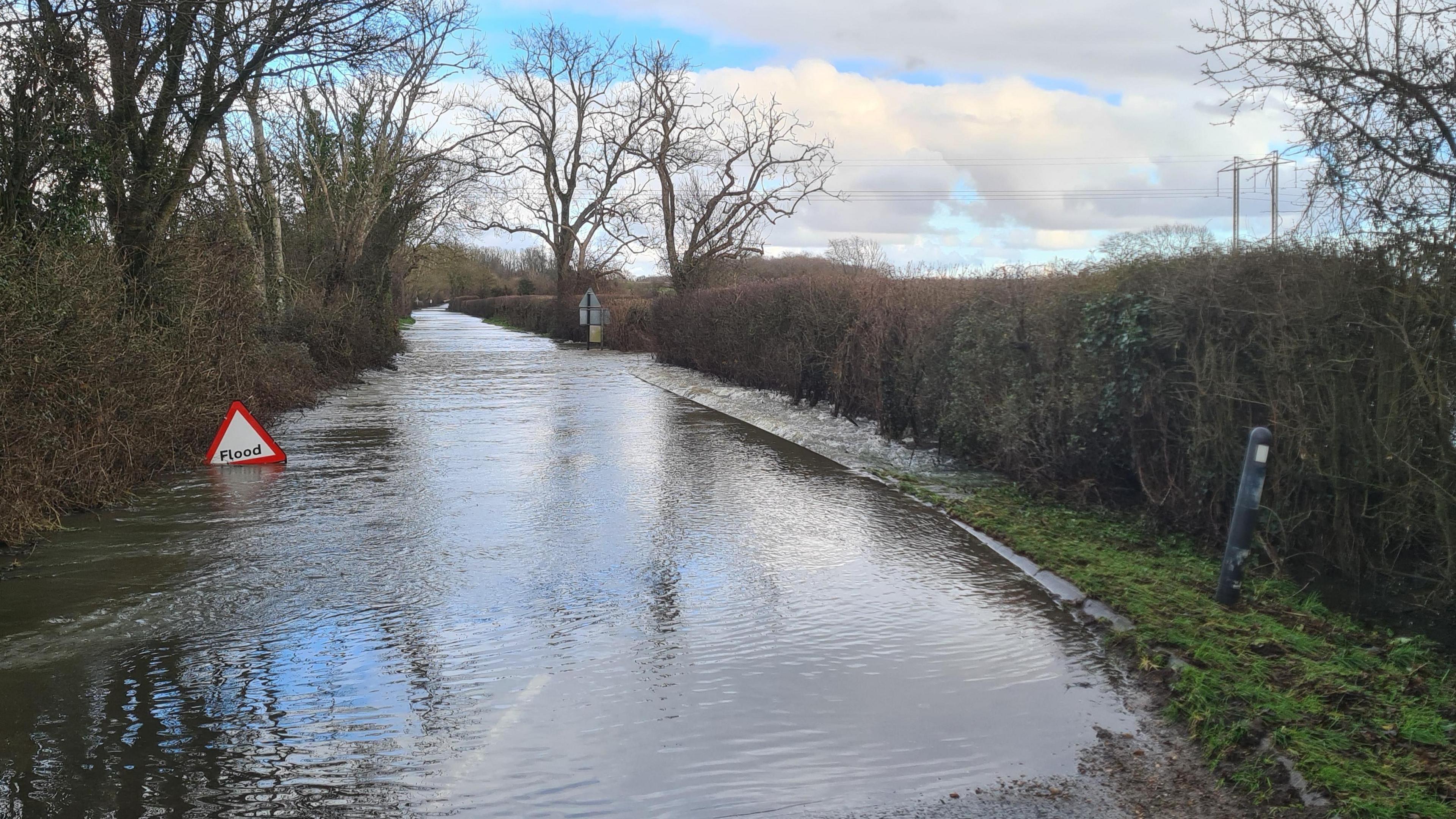 Storm Chandra: 'Danger to life' flood warning remains in Dorset - BBC News