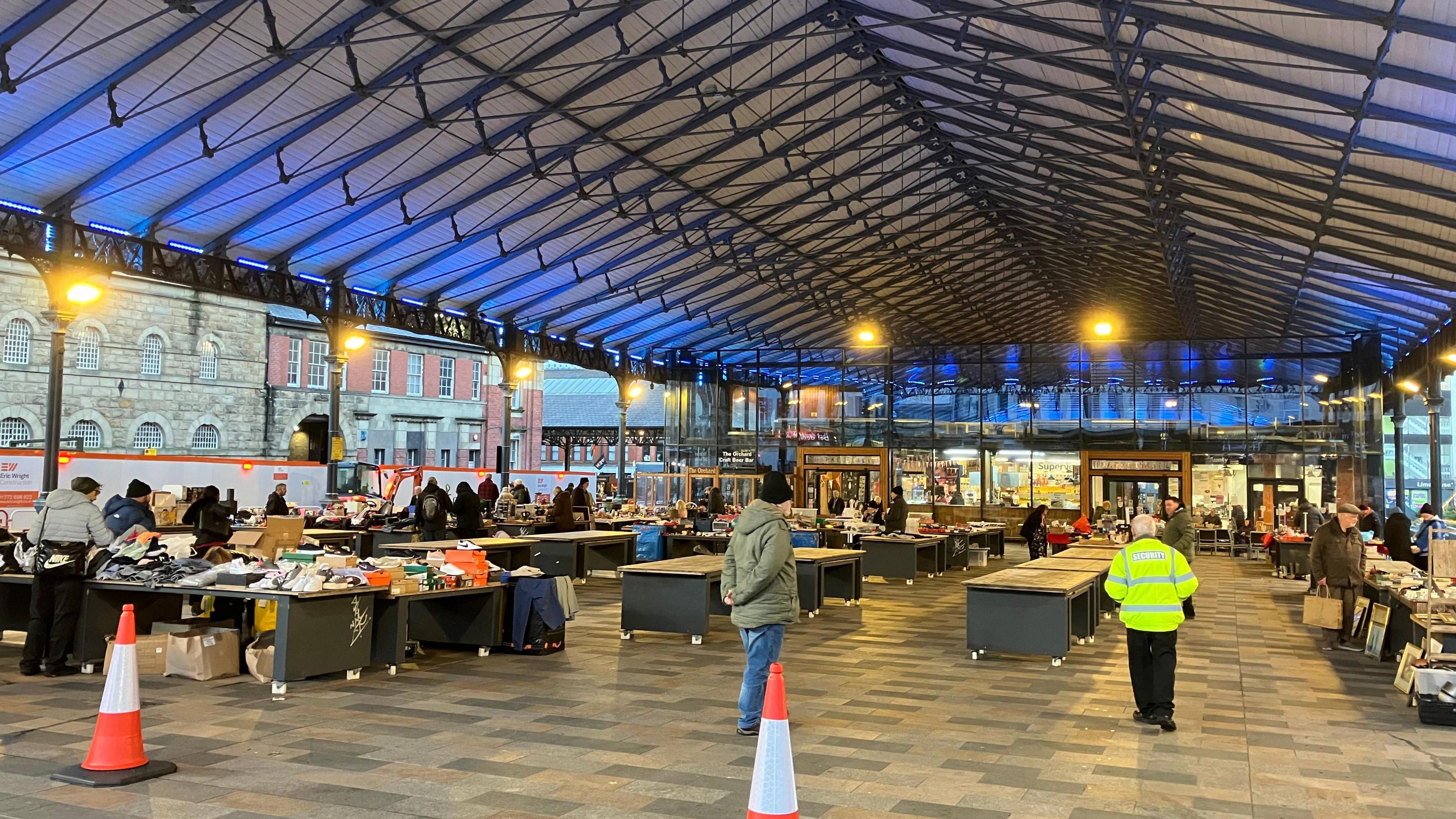 Preston market traders return after relocation row with council - BBC News