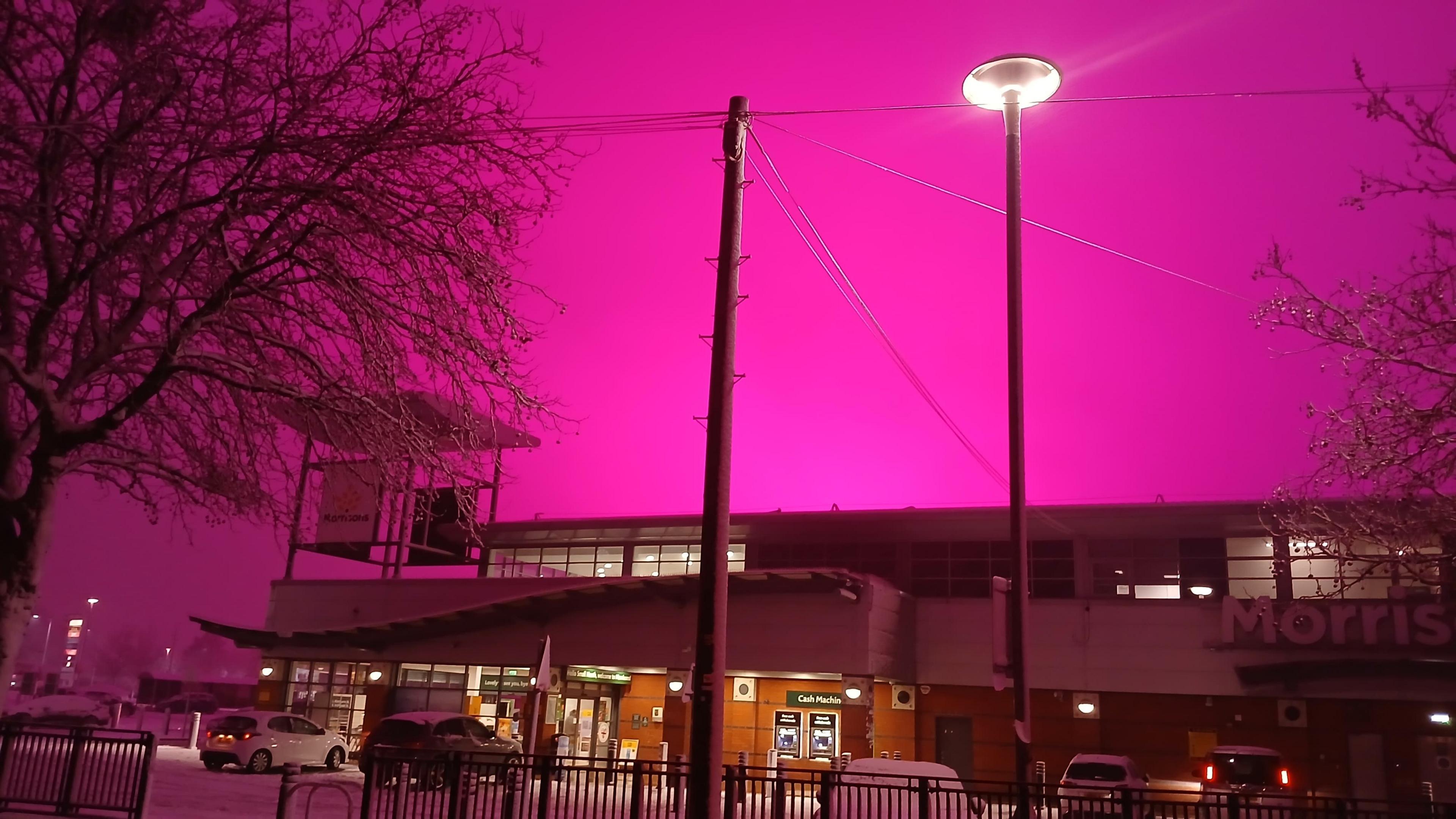 Dazzling pink sky seen over Birmingham in Storm Goretti snowfall - BBC News