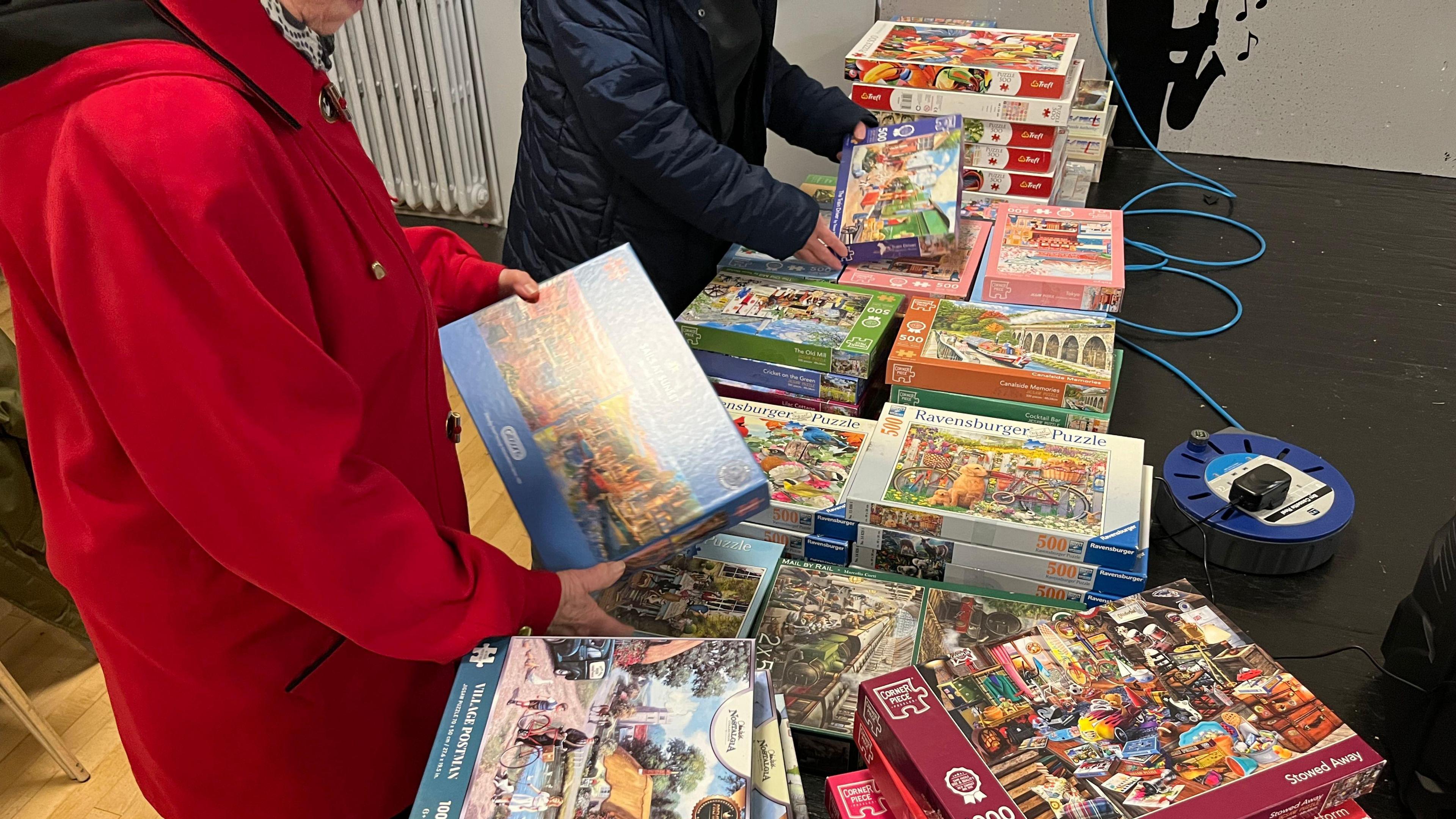 March jigsaw puzzle lovers raise £15k for charity through library - BBC ...