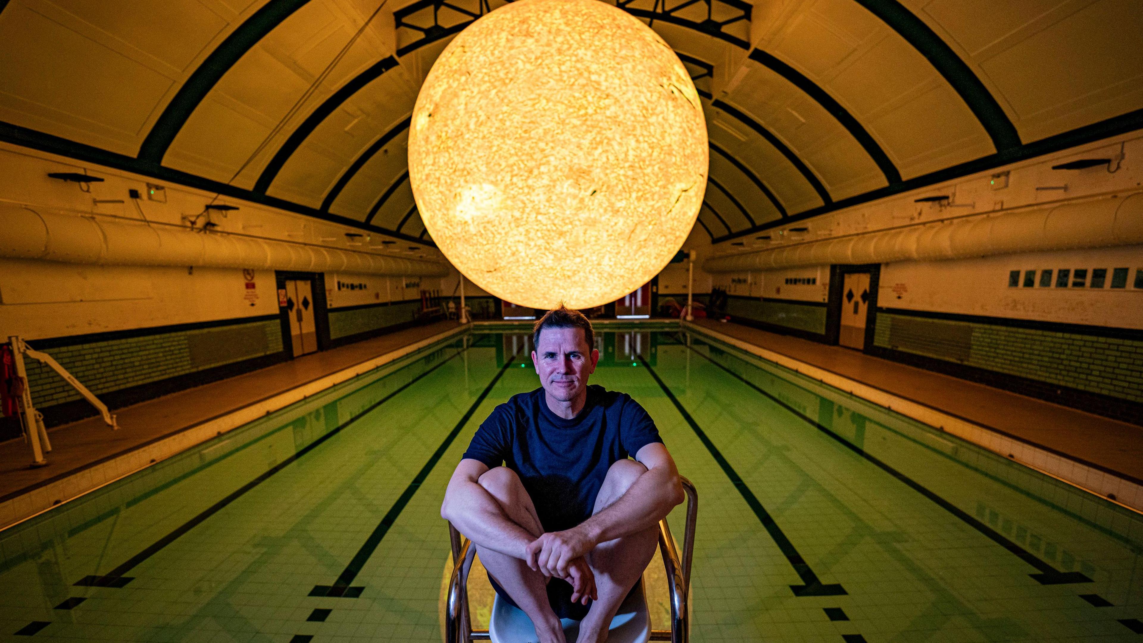 Luke Jerram's sun-inspired sculpture on display at Bristol pool - BBC News
