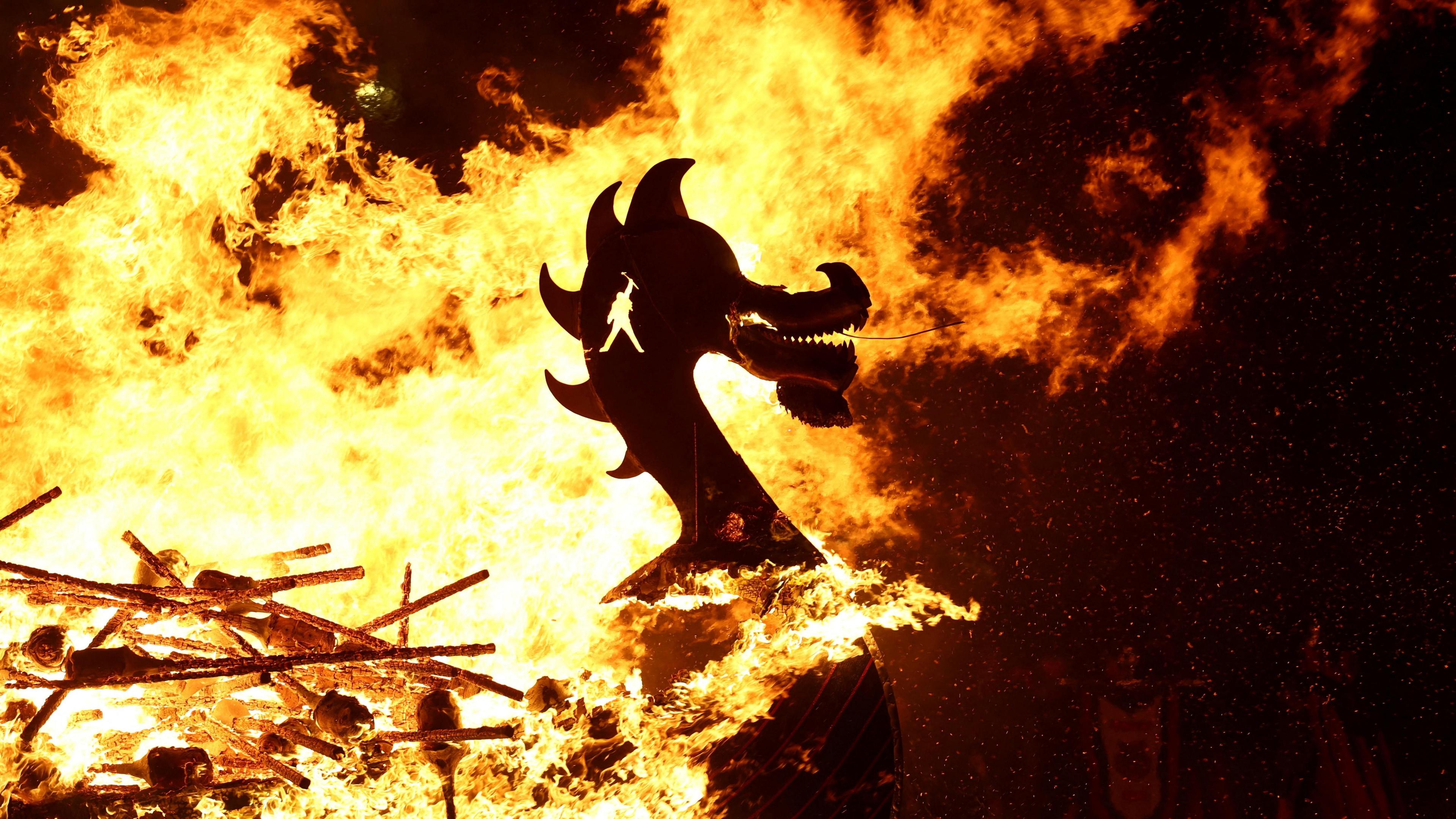Famous Up Helly Aa festival sets Shetland's skies ablaze - BBC News