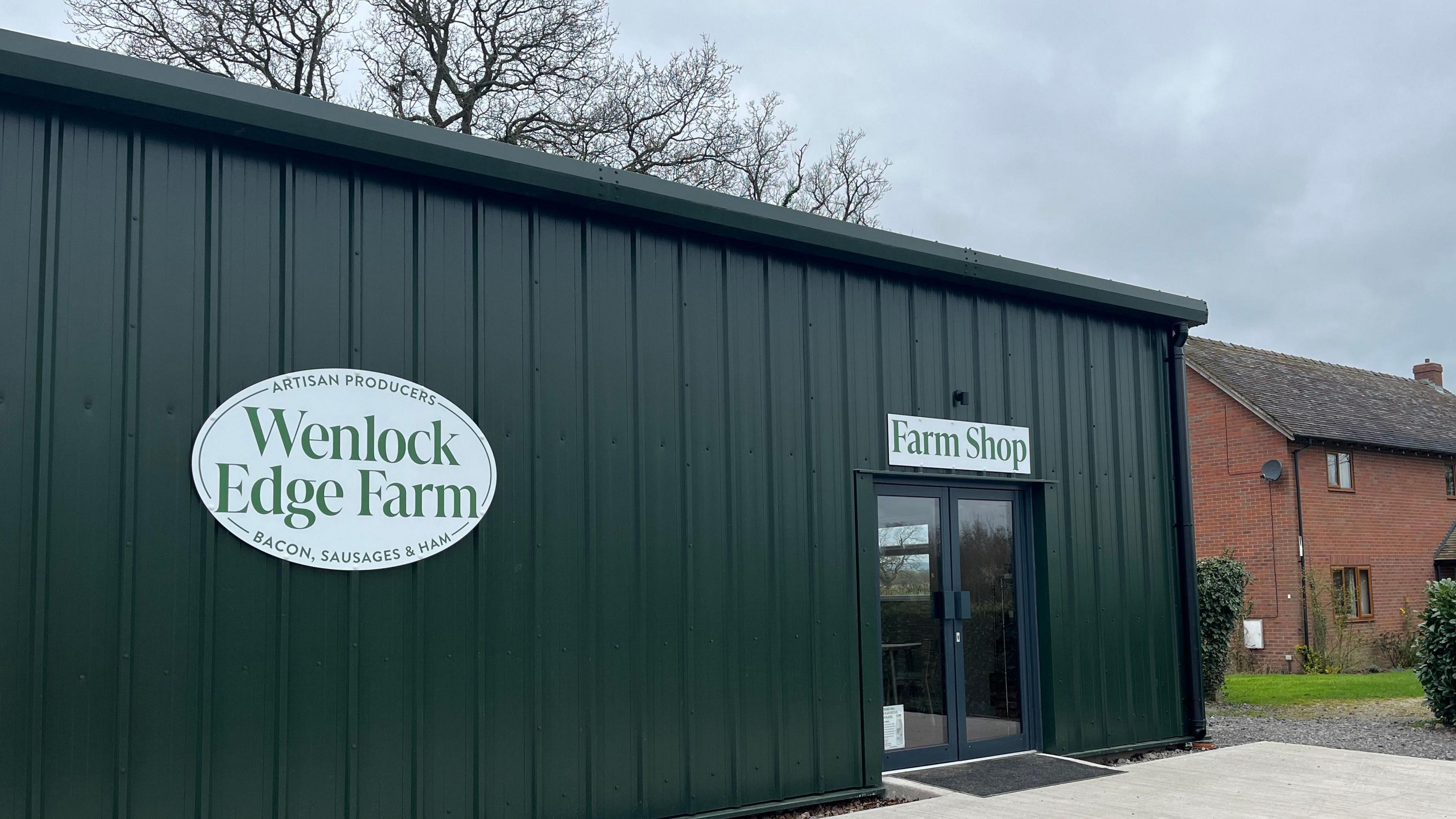 Much Wenlock farm shop destroyed by fire reopens 10 months on - BBC News