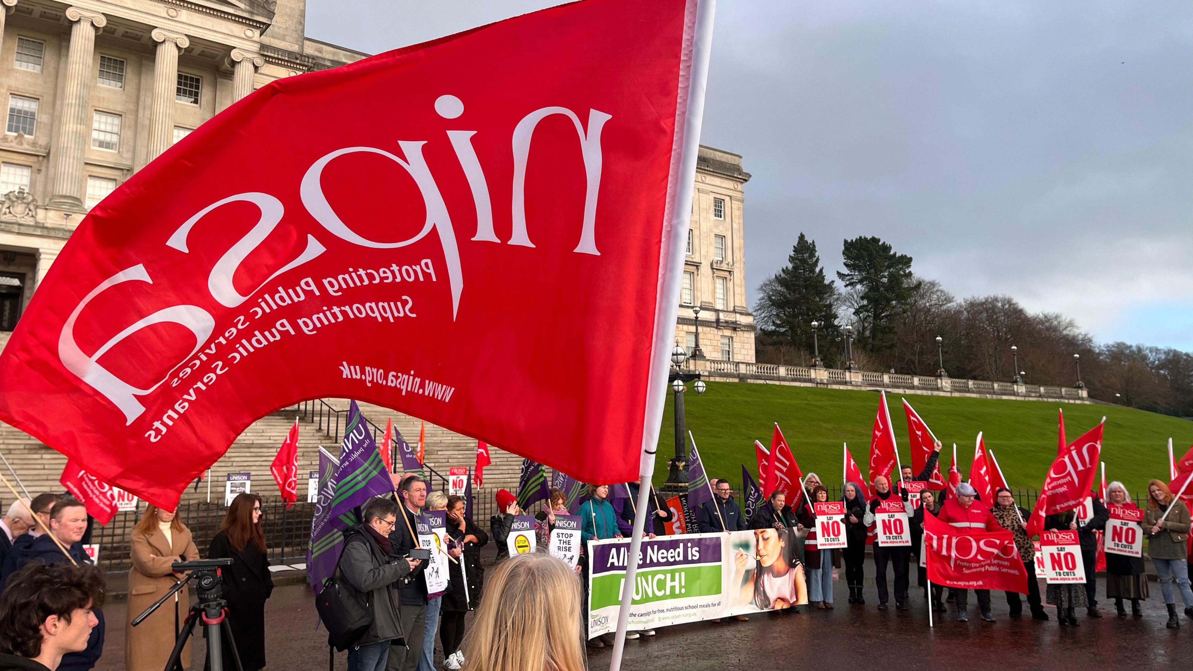School meal price hike: Teaching unions hold protest at Stormont - BBC News