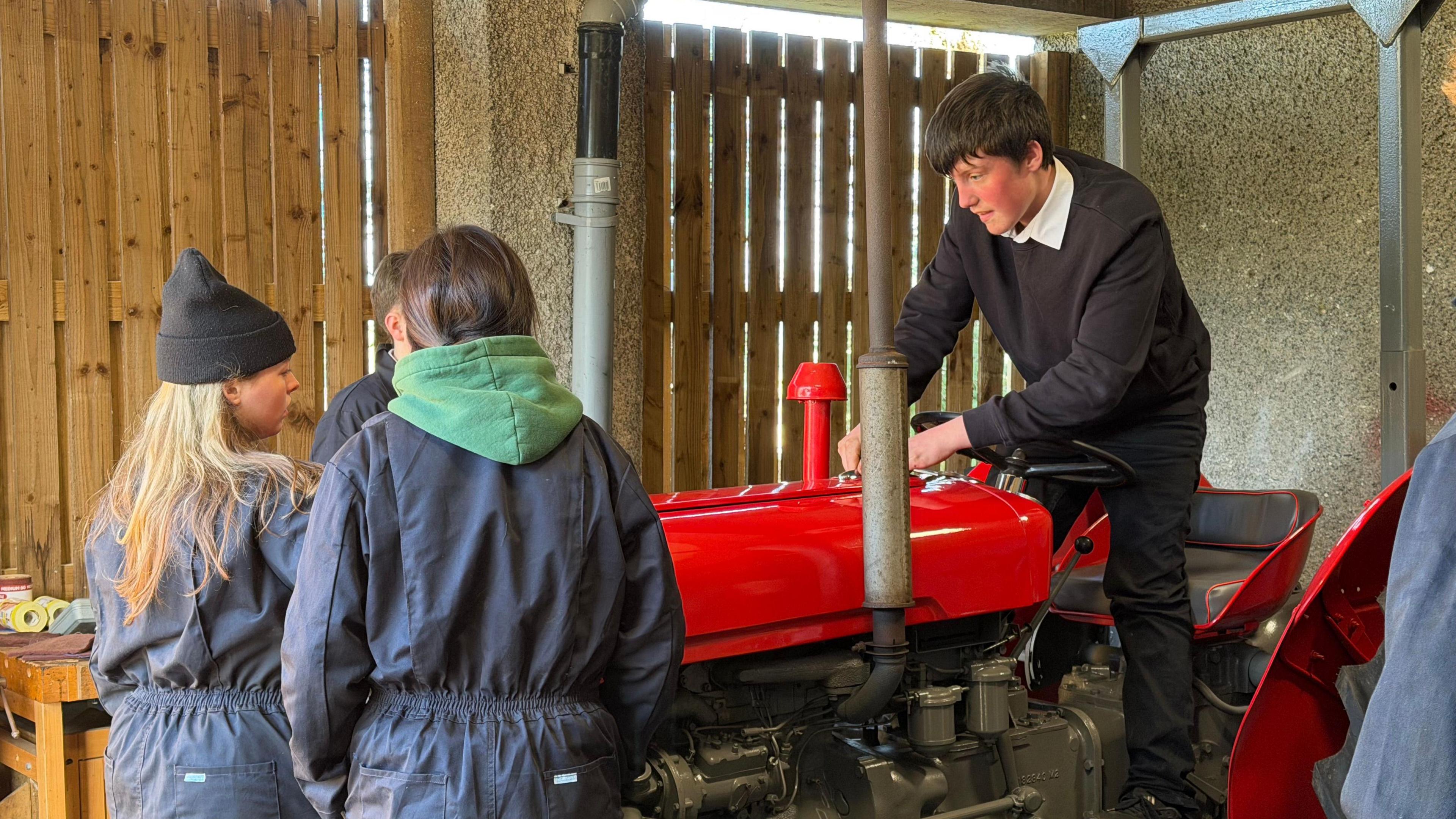 Selkirk students restore vintage tractor with traditional skills - BBC News