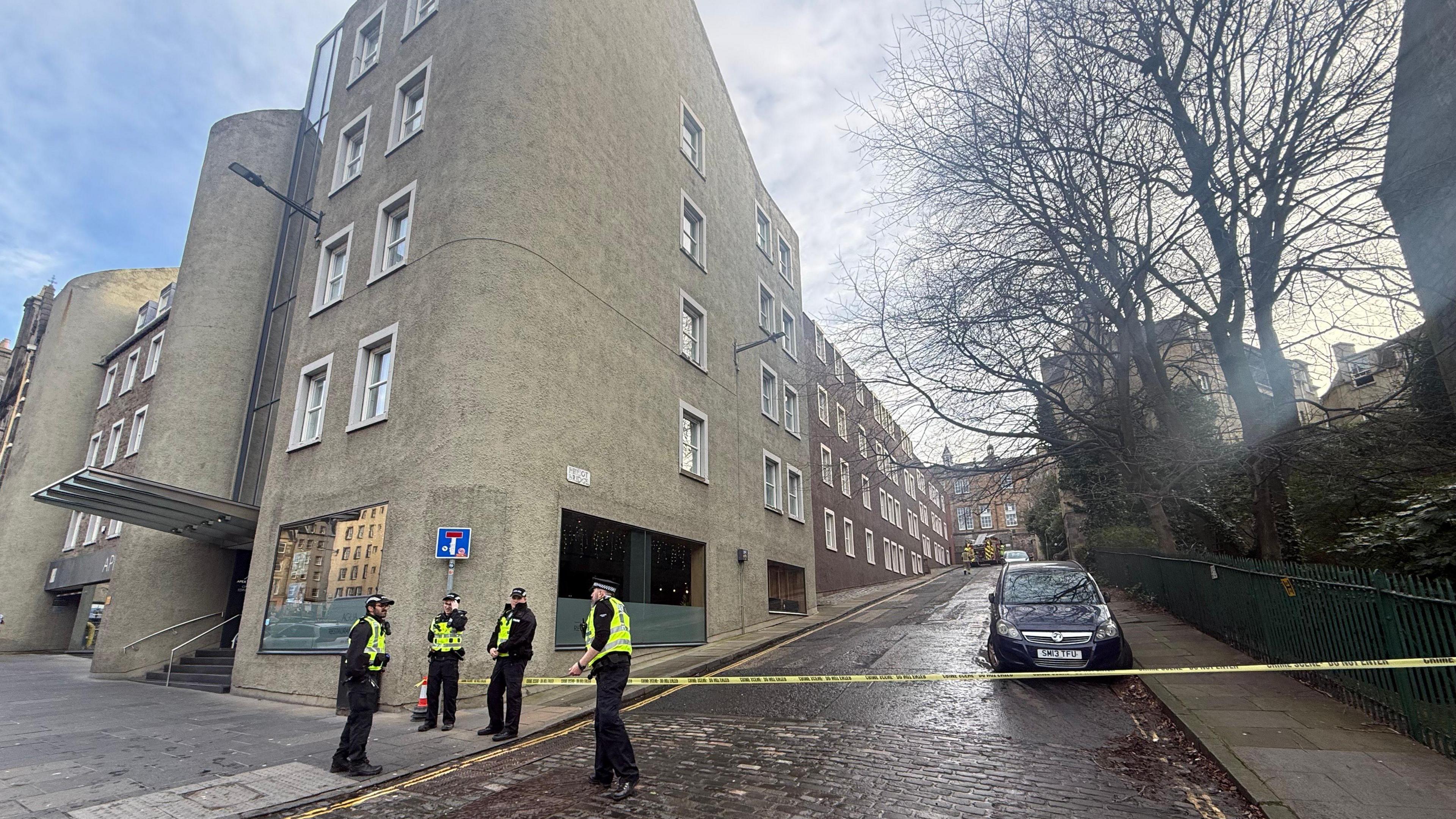 Firefighter among two injured in Edinburgh flat fire - BBC News