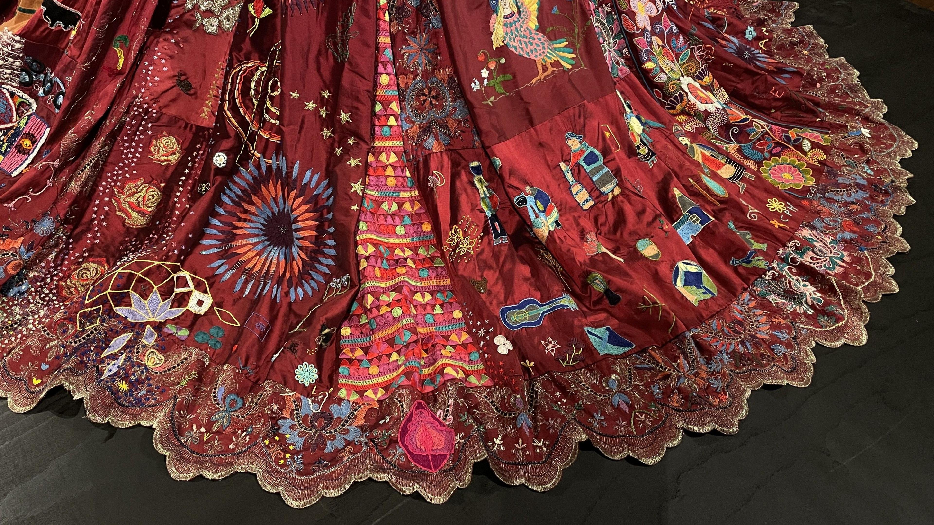 Record-breaking silk dress on display in Devon - BBC News