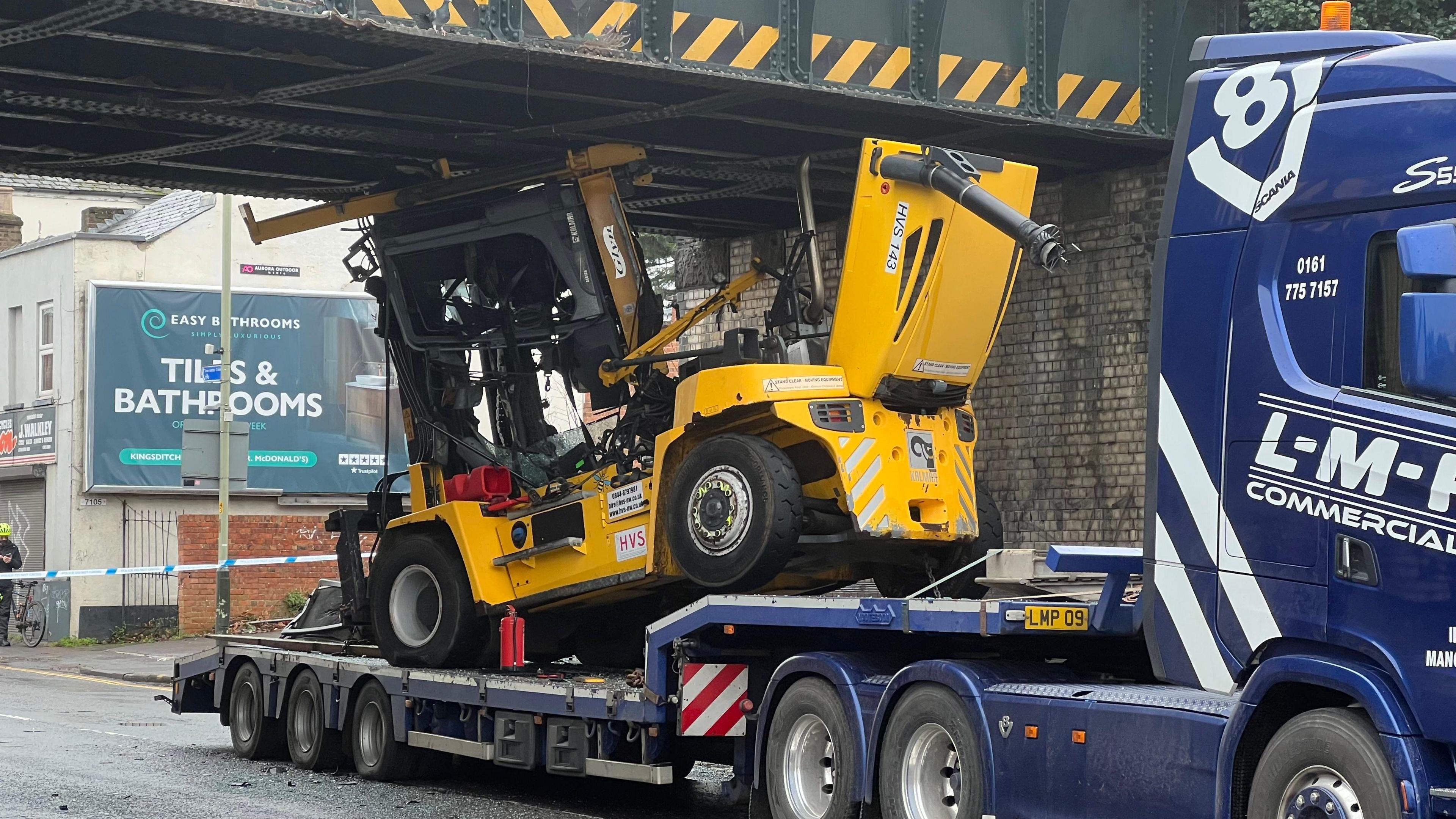 Cheltenham road closed by lorry stuck under bridge reopens - BBC News