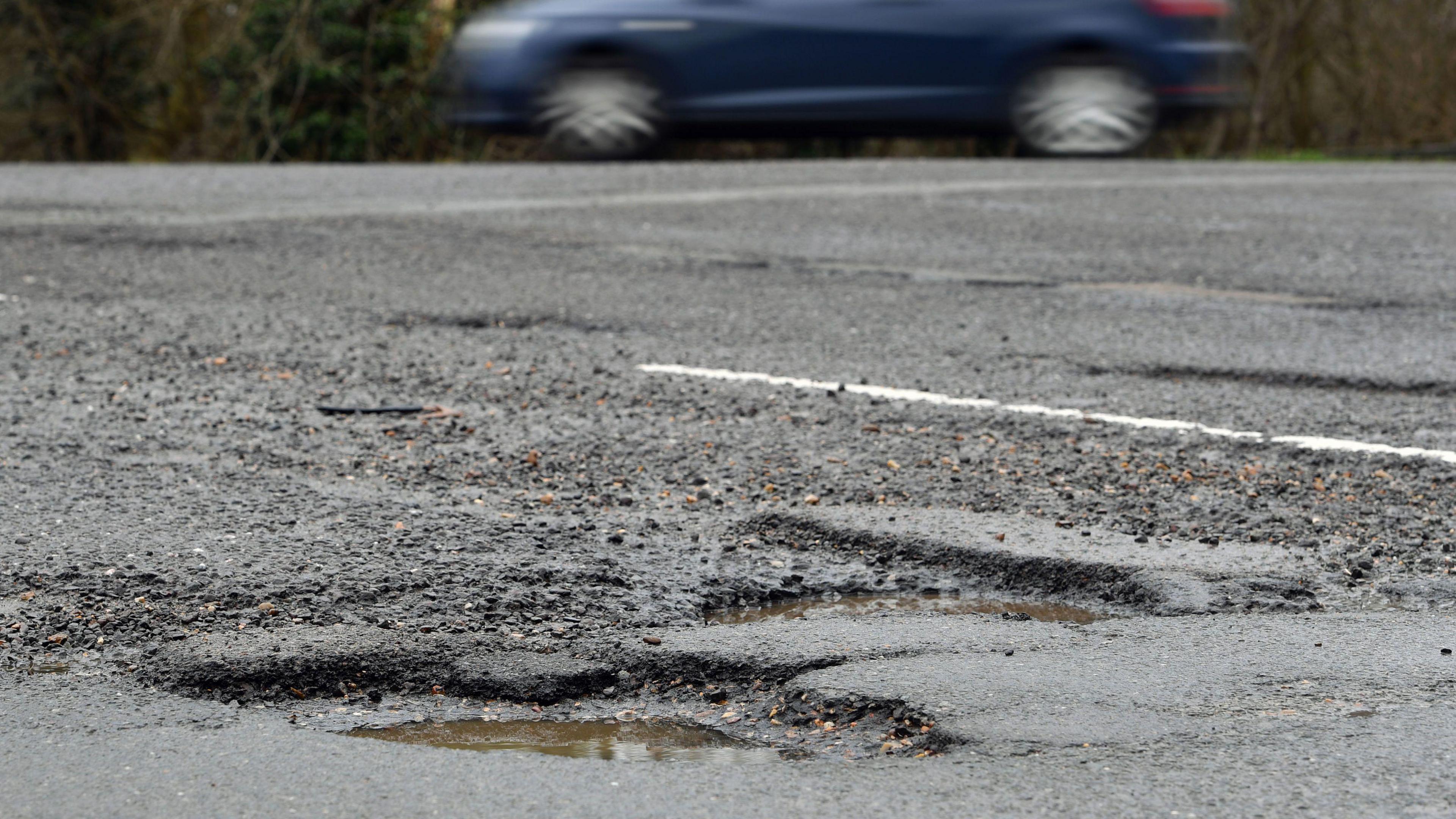 More crews to tackle pothole problems in Cambridgeshire - BBC News
