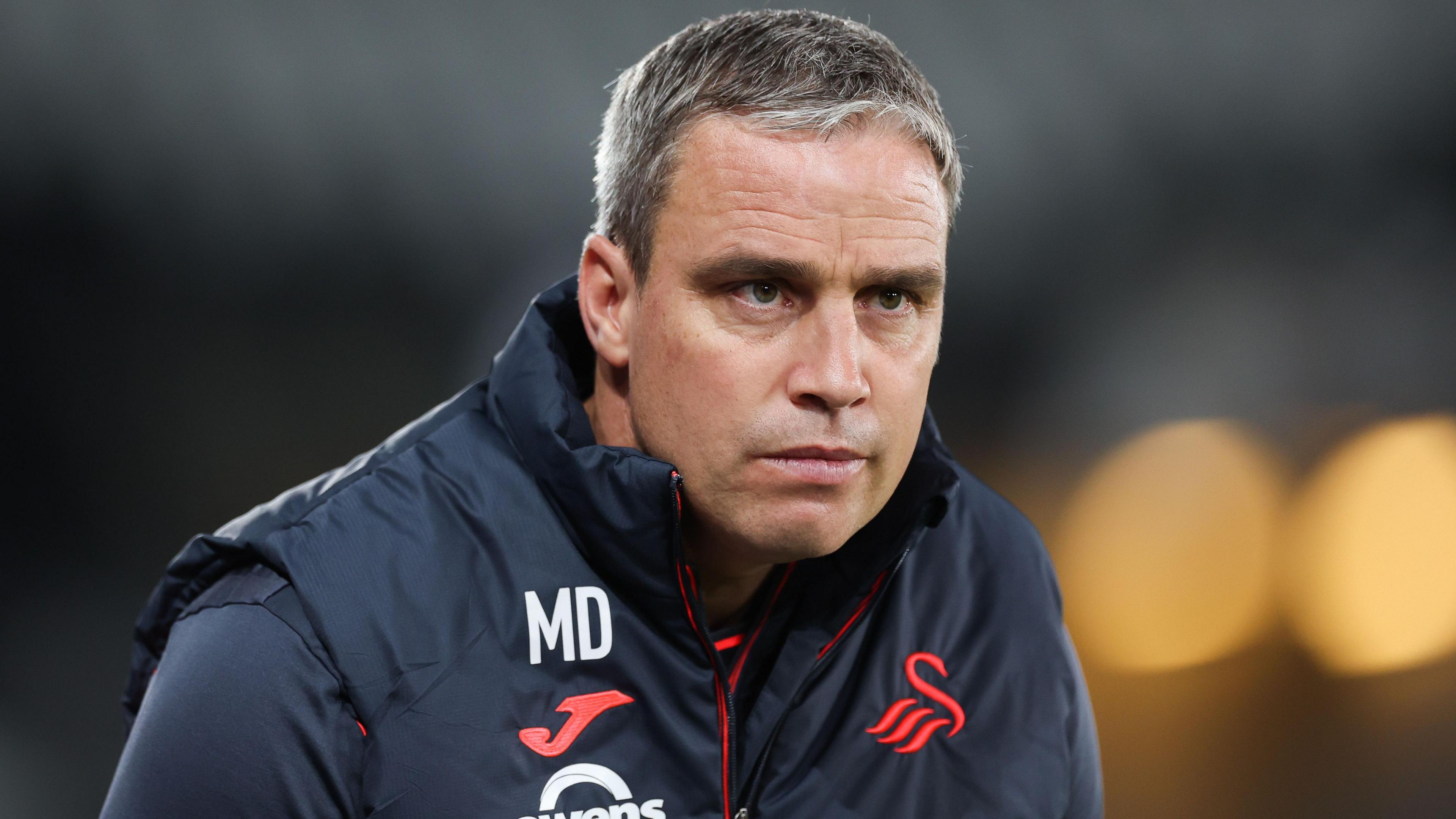 Michael Duff: Ex-Swansea City boss takes over at Huddersfield - BBC Sport