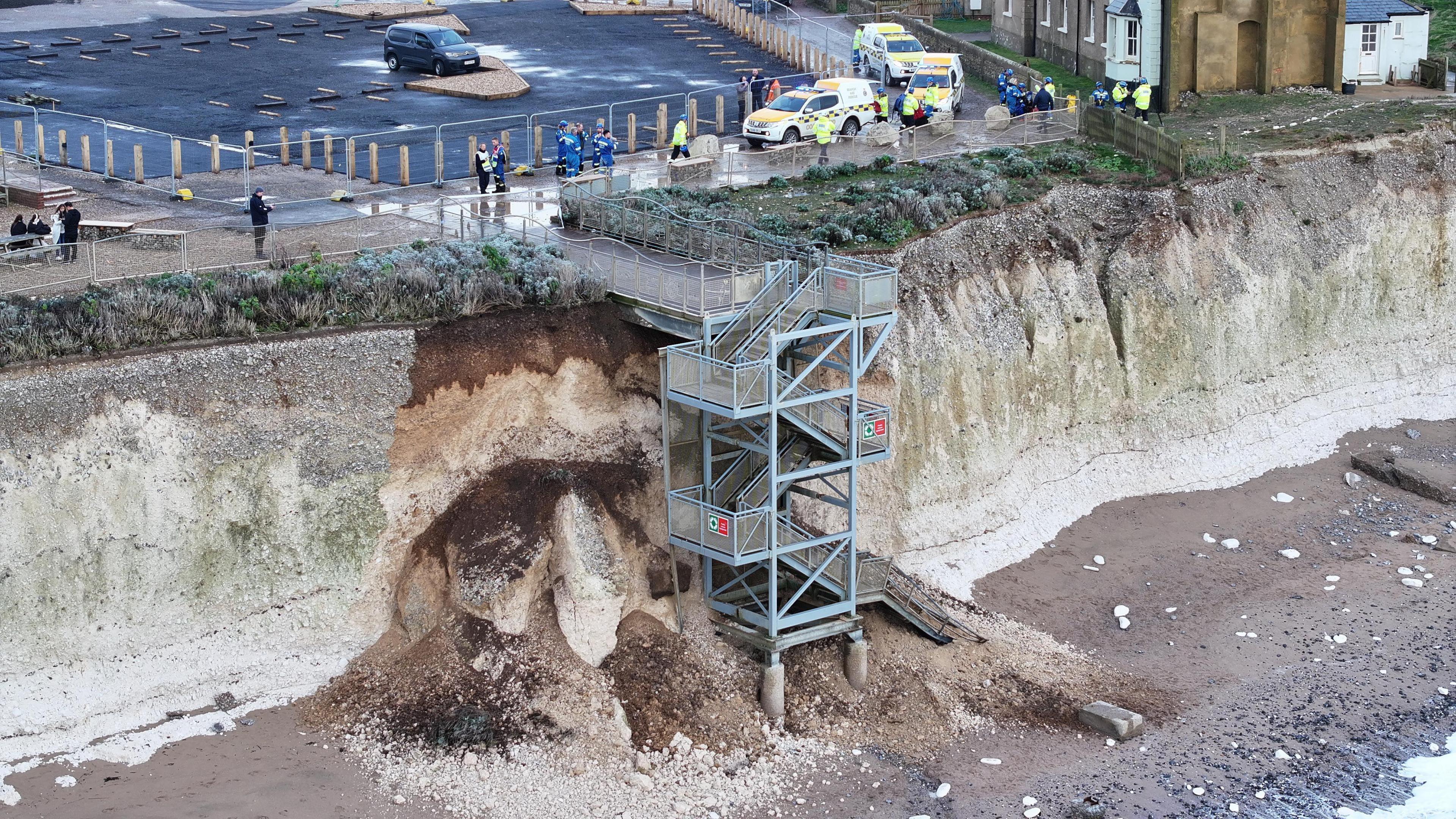 Families rescued after getting stuck on Birling Gap beach - BBC News