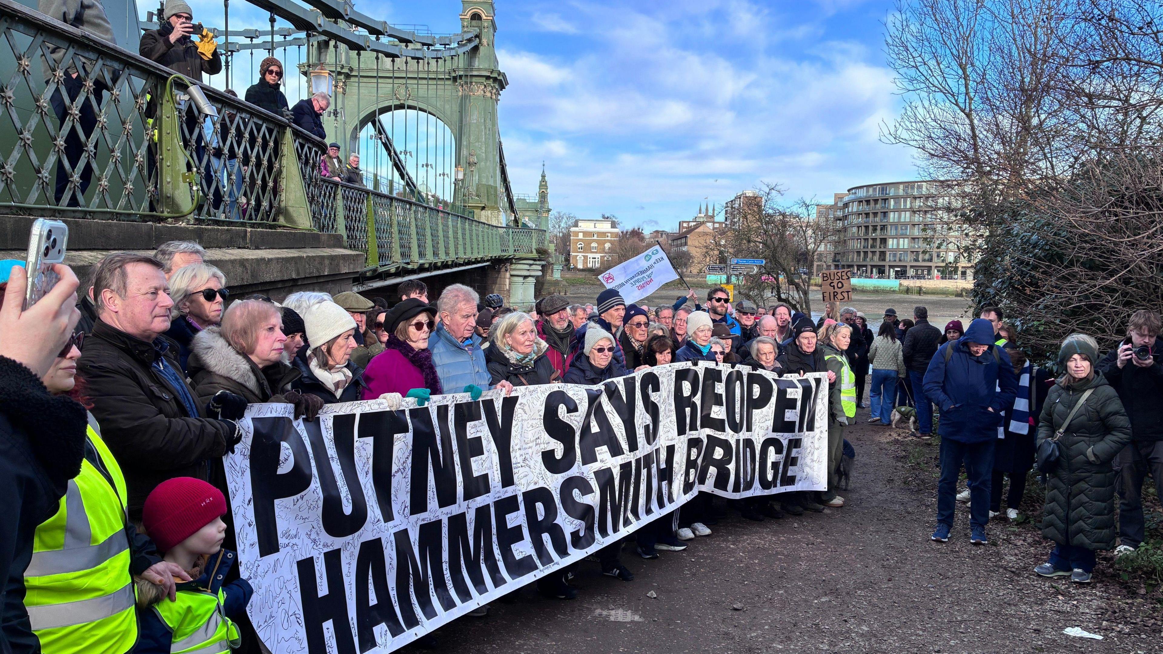 Protest calls for Hammersmith Bridge to reopen to vehicles - BBC News