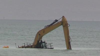 The digger stuck at sea! - BBC Newsround