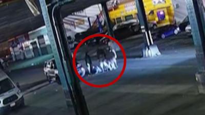 Men seen entering NYC sewer manhole in surveillance footage - BBC News