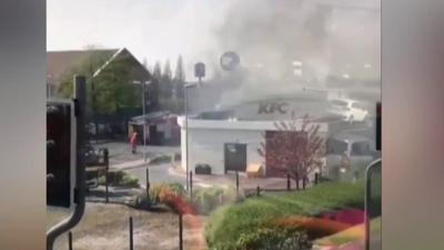 Greater Manchester KFC set on fire by burning car - BBC News