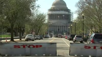 US Capitol shooting: Police shoot armed man at visitor centre - BBC News
