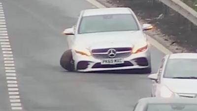 Car missing a wheel driven on M1 in Bedfordshire after crash - BBC News