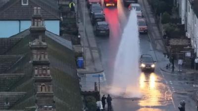 Burst hydrant in Lowestoft causes water to fire into air - BBC News