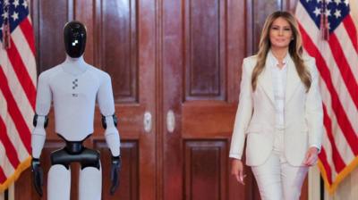 First Lady Melania Trump arrives with humanoid robot at tech summit ...