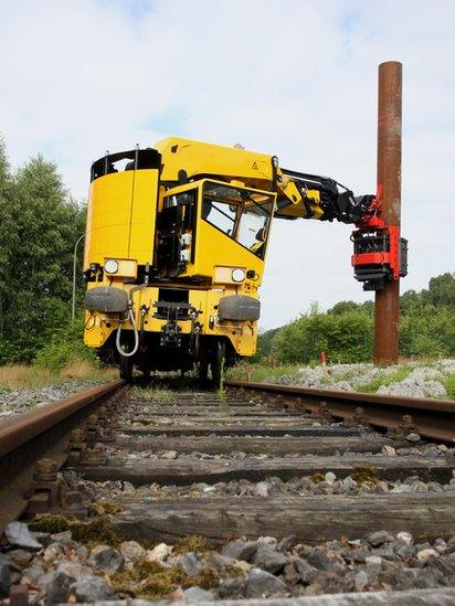 'Factory on wheels' delays rail electrification by a year - BBC News