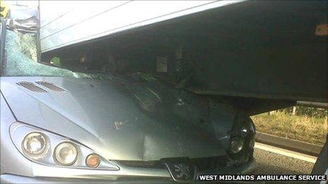 Car bonnet under lorry after Stoke crash - BBC News