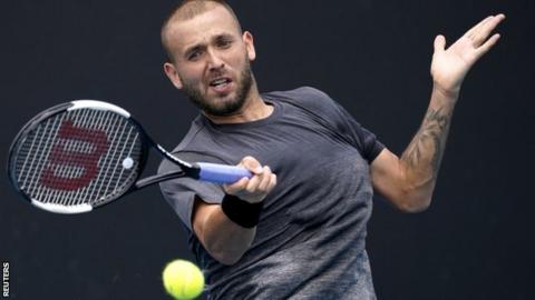 Australian Open: Dan Evans fights back to reach second round - BBC Sport