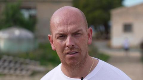 John George: Mother says family is 'living a nightmare' - BBC News