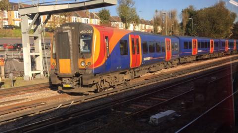 South Western Railway train derails near Wimbledon - BBC News