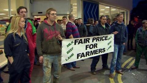 Farmers in fresh protests over supermarket milk prices - BBC News