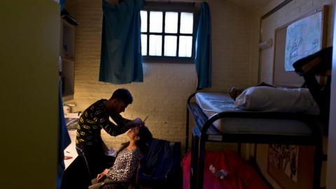 In pictures: The Dutch prison asylum seekers call home - BBC News