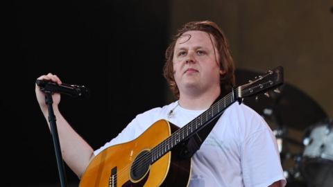 Lewis Capaldi: Crowd offers support as he struggles to finish ...