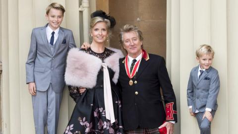 Sir Rod Stewart knighted at Buckingham Palace - BBC News