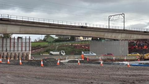 Construction completed on new £60m Penrith M6 rail bridge - BBC News