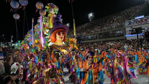 People in Brazil celebrate Carnival with mud parties - BBC Newsround