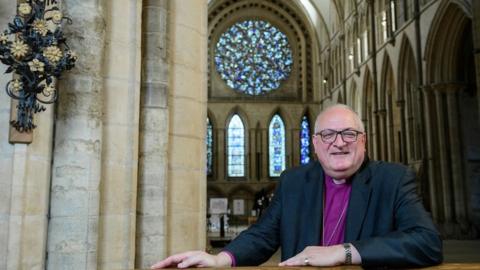New Bishop of Lincoln installed in cathedral ceremony - BBC News
