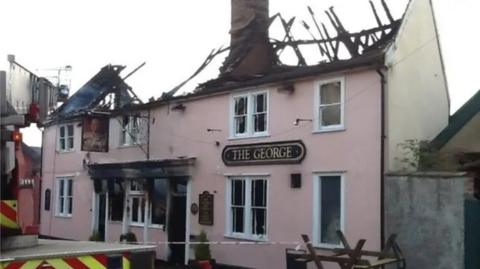 Suffolk pub The George reopens in Wickham Market after 2013 fire - BBC News