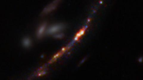 Firefly Sparkle: 'Christmas' galaxy reveals how Universe formed - BBC News