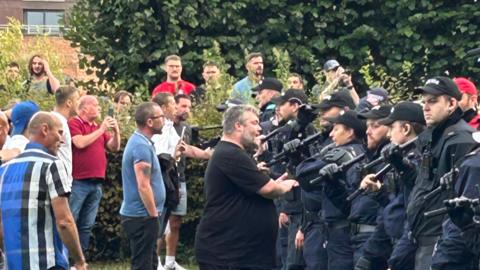 More than 90 arrests made after unrest breaks out at protests - BBC News