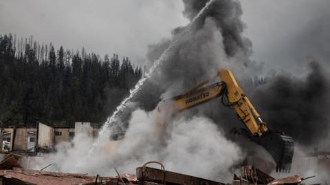 Jasper fire: Images show destruction from wildfire in Canada - BBC News