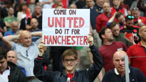 Manchester attack: City finds strength in music and sport - BBC News