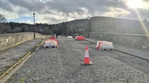 Repairs to Aberdeenshire bridge closed for two years put on hold - BBC News