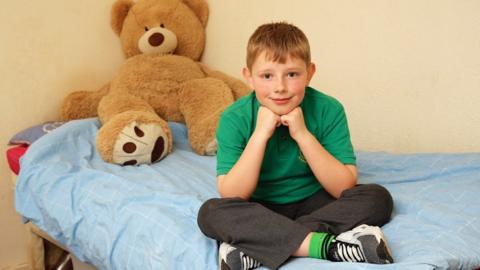 Boy, 9, found hiding under bed after three-hour search - BBC News