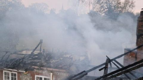 Roof collapses as fire rips through Wherwell home - BBC News
