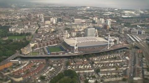 Rugby World Cup: Giant ball 'crashes' into Cardiff Castle - BBC News