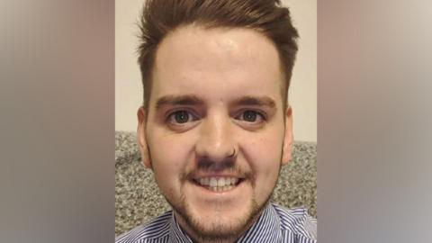 Man, 33, arrested in tower block murder probe - BBC News