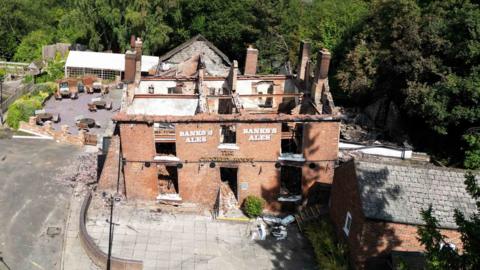'Questions need answering' over Crooked House fire - BBC News