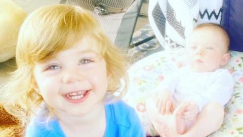 Matilda Sheils: Body found in search for missing US two-year-old - BBC News