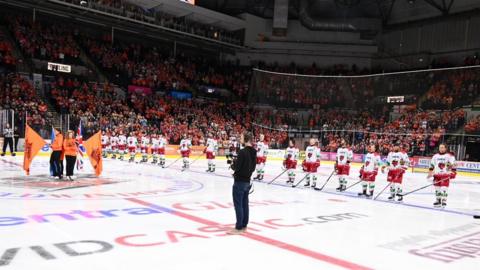 Fans pay tribute to ice hockey player Adam Johnson one year on - BBC News