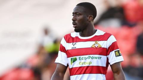Joseph Olowu: Stockport County sign Doncaster Rovers defender on three ...